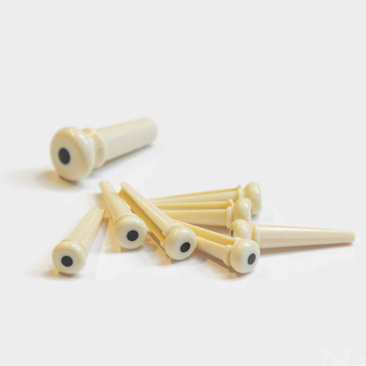 Martin Acoustic Guitar Bridge Pin Set, White w/ Black Dot - Strings Direct